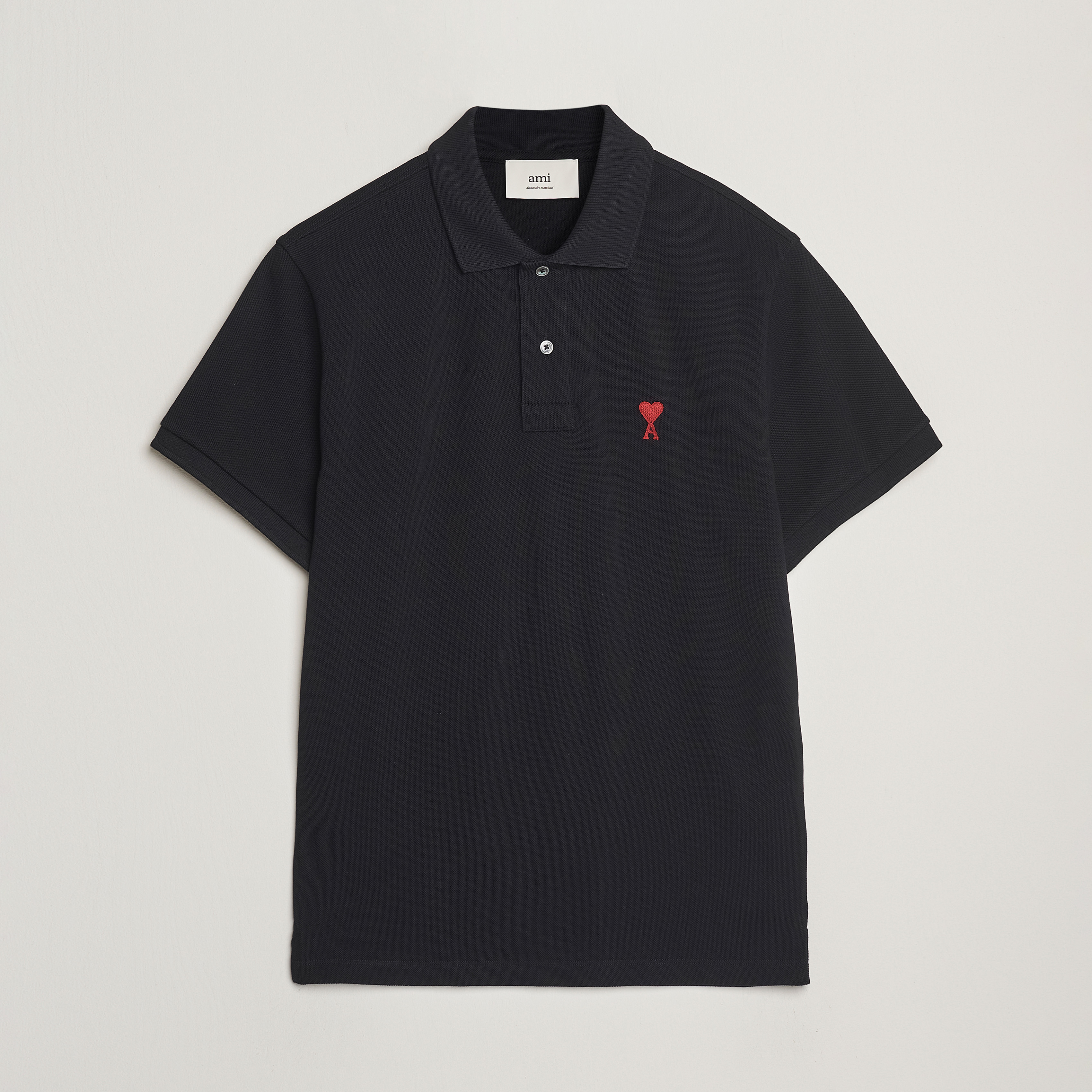 AMI Heart Logo Polo Black hos CareOfCarl.no