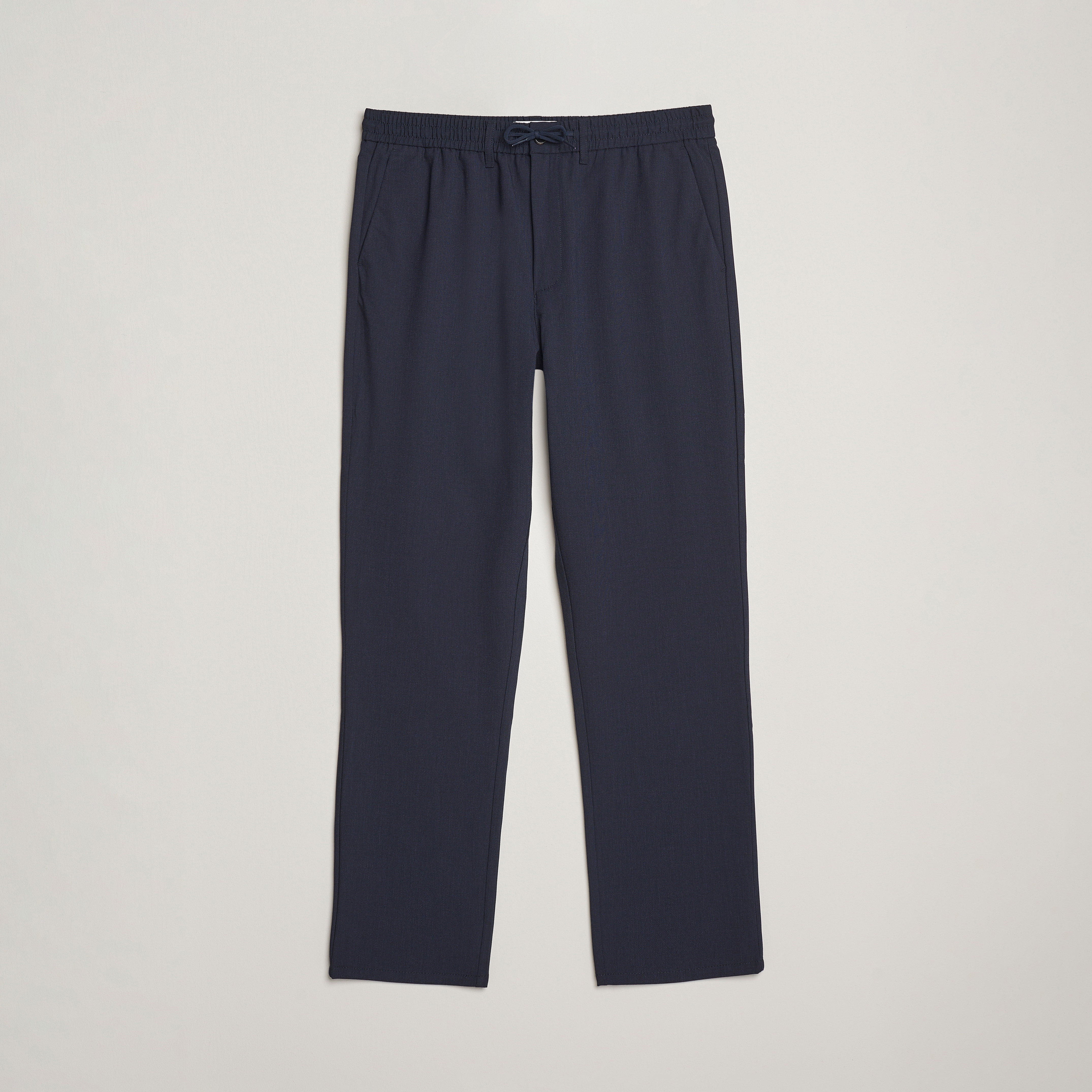 Les Deux Como Tapered Textured Pants Dark Navy Blue hos CareOfCarl.no